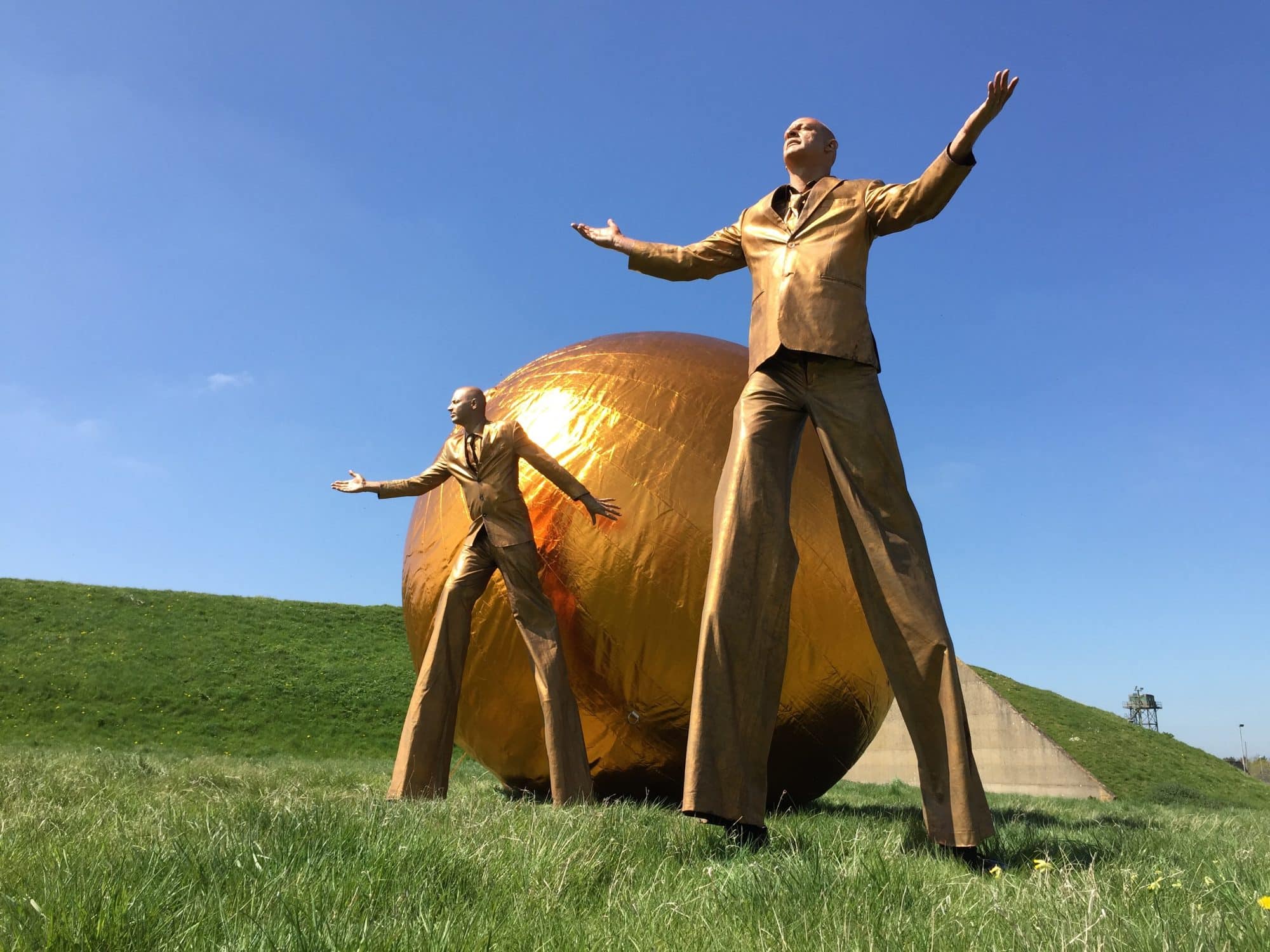 The Gold People Stilt Walkers | Hire Gold Themed Stilt Walkers